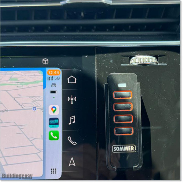 Holder for installing the hand-held transmitter in a car or on the wall